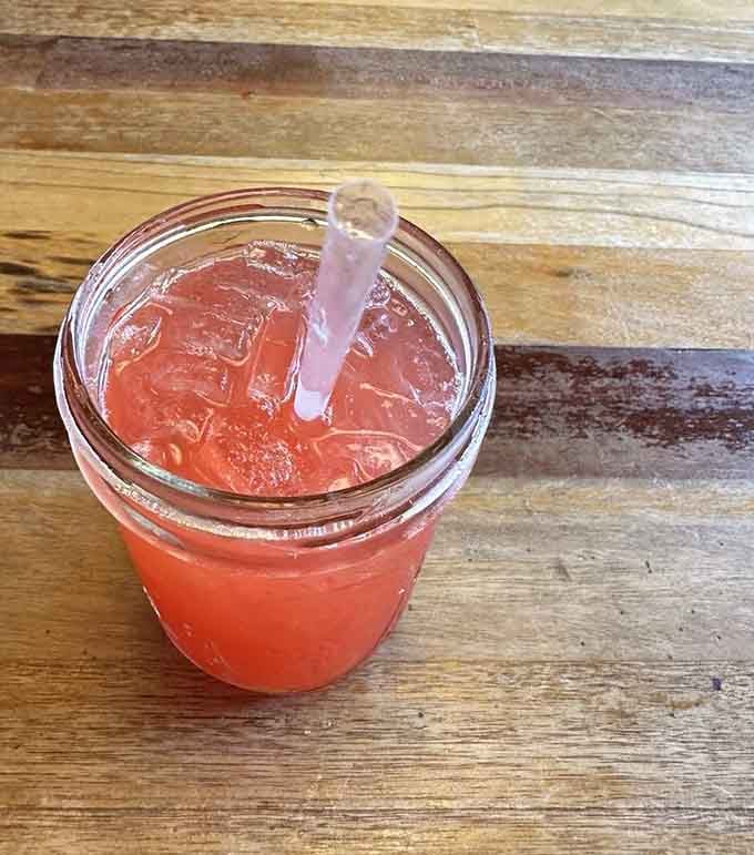 Served in a mason jar with a straw, this drink is cheerful, cold, and looks like a Missouri summer afternoon in a glass.