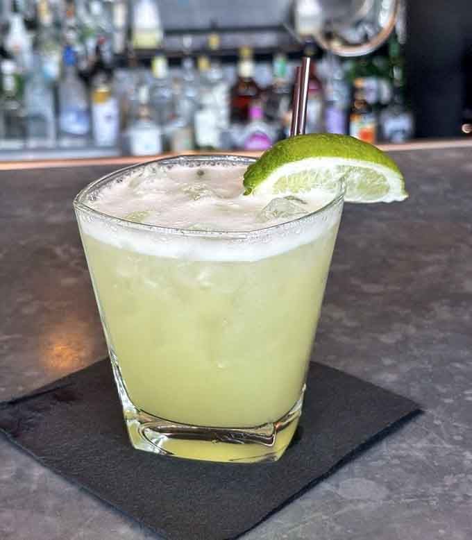 A perfectly crafted margarita provides liquid courage before tackling those massive steaks ahead.