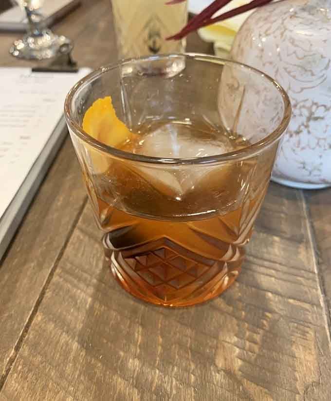 A proper old fashioned with an orange peel, served in a gorgeous cut glass. Some drinks just look like they mean it.