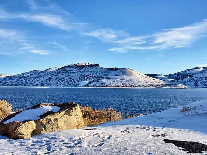 Snow-dusted hills meet deep blue water. Blue Mesa Reservoir in winter is quietly breathtaking.