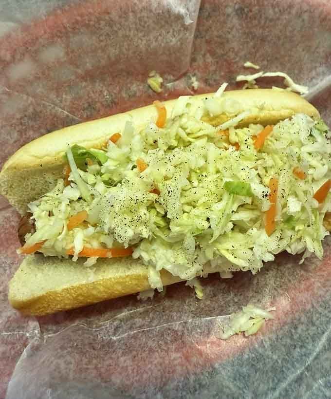 Canadian slaw dog brings coleslaw to the party, proving vegetables can hang with the cool kids after all.