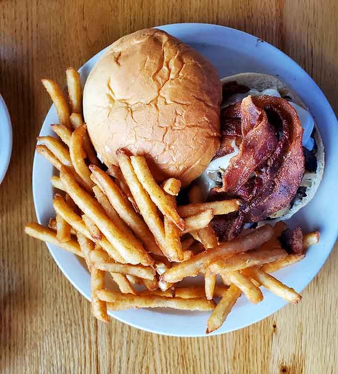 A bacon cheeseburger and a pile of fries walk into a supper club. The ending is delicious and deeply satisfying.