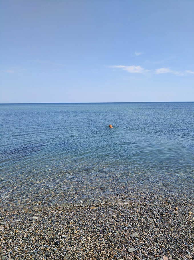 The water at Brant Rock Beach is so clear and calm it almost looks too good to be real.