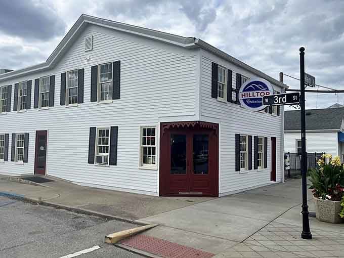 The Hilltop's classic white exterior and black shutters promise good times inside, like a friend's house you've been meaning to visit.