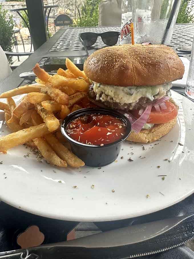 A burger this loaded requires both hands, a napkin strategy, and possibly a moment of silent gratitude before diving in completely.