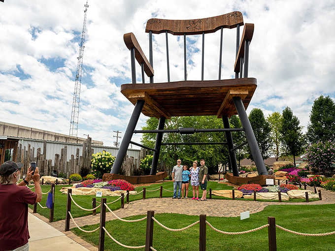 Families line up to feel wonderfully small next to Casey's world-record rocking chair. Totally understandable.