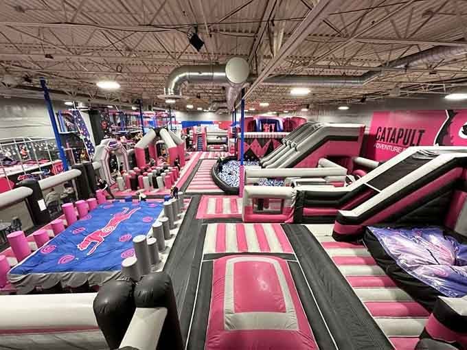 Wall-to-wall pink and built for bouncing. This inflatable zone is basically a playground that swallowed another playground whole.