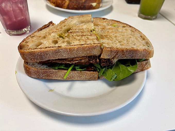 Grilled chicken on sourdough with fresh arugula, because lunch items at breakfast time should always be an option.