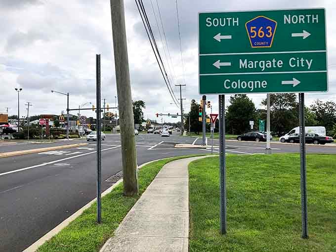 Directional signs pointing to Margate City and Cologne, your roadmap through Atlantic and Burlington County treasures.