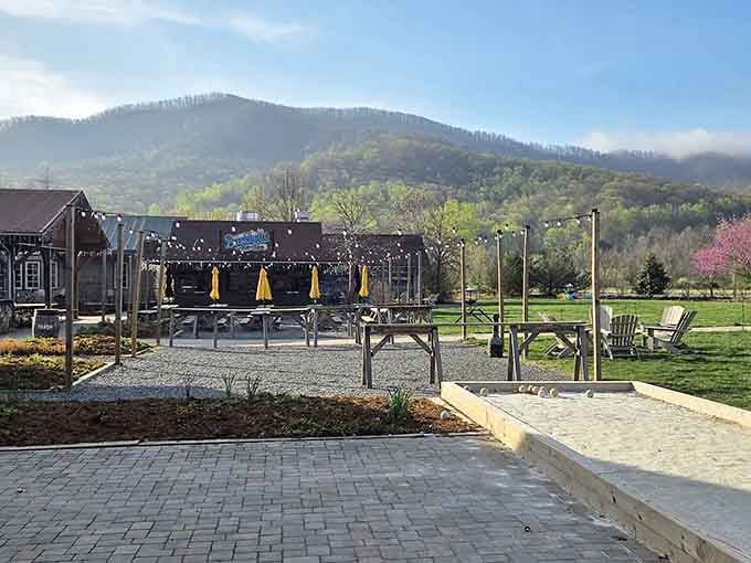 Bocce courts, string lights, and mountain mist rolling in. This outdoor space is what your backyard wishes it could grow up to be.