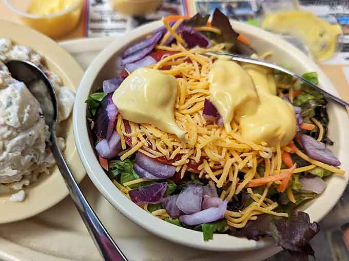 Even the salad shows up looking colorful and dressed for the occasion. Mixed greens never had it so good.