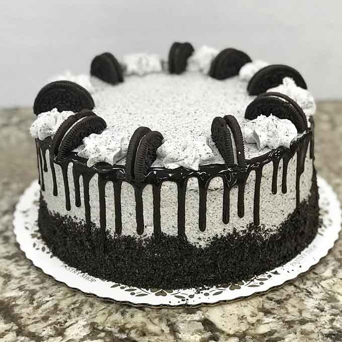 Cookies and cream fans, meet your dream cake: Oreos, frosting, and chocolate drizzle in perfect harmony together.