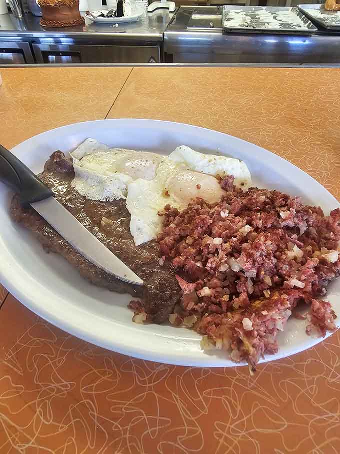 Steak and eggs with corned beef hash&mdash;the breakfast that says "I'm here to accomplish things today."