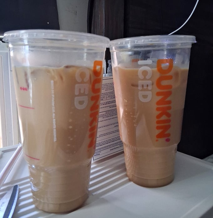 Two iced coffees standing ready to fuel your day, because some traditions are worth keeping ice-cold year-round in New England.