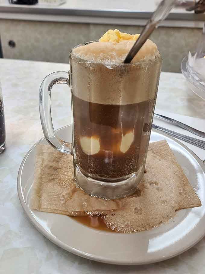 A root beer float so perfectly assembled it deserves its own slow-motion entrance music.