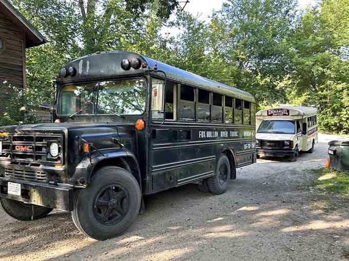 The legendary black Fox Hollow bus waits patiently, ready to shuttle tubers upstream for the float of their lives.