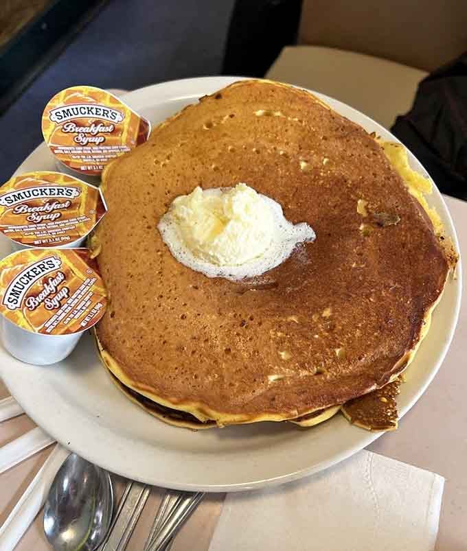 These pancakes are so big they need their own zip code, and that's exactly how breakfast should be.