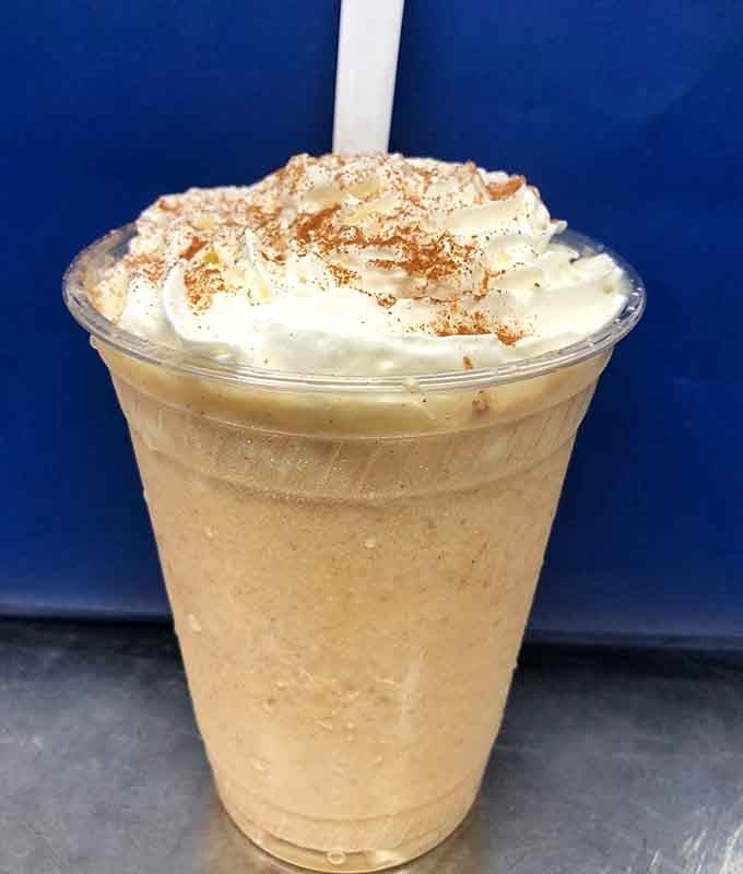 Whipped cream, a dusting of spice, and a thick creamy shake that tastes like autumn in a cup.