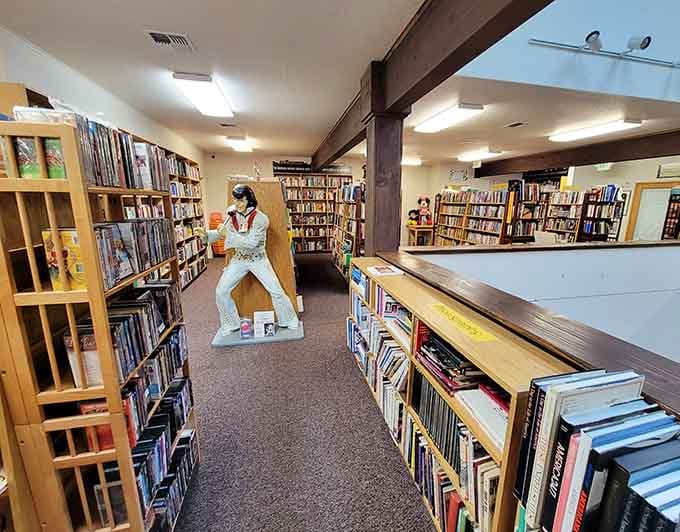 An Elvis statue standing guard between the shelves is exactly the kind of surprise that makes this place unforgettable.