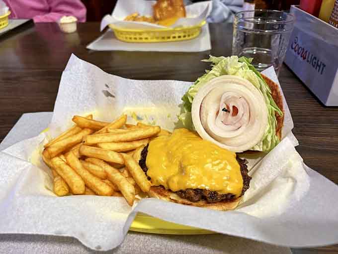 The Coney Burger is what happens when two great ideas have a delicious baby on a toasted bun.