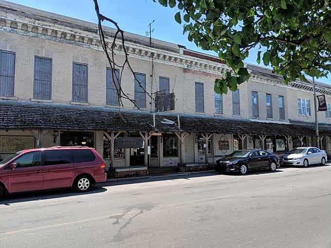 These long historic storefronts have sheltered shoppers for generations. Good bones, great stories.