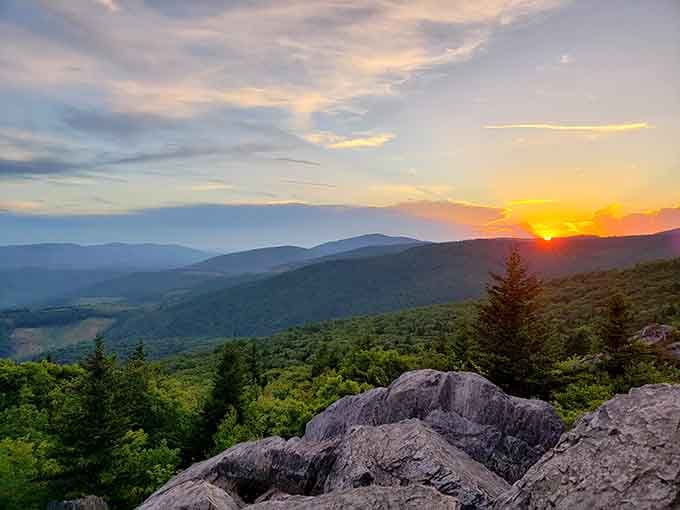 Sunset over layered mountains turns the rocks into front-row seats for nature's nightly spectacular performance.