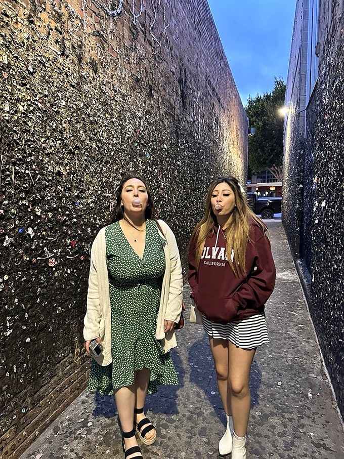 Two friends, two bubbles, and one very sticky backdrop that makes for the best travel photo you'll take all year.