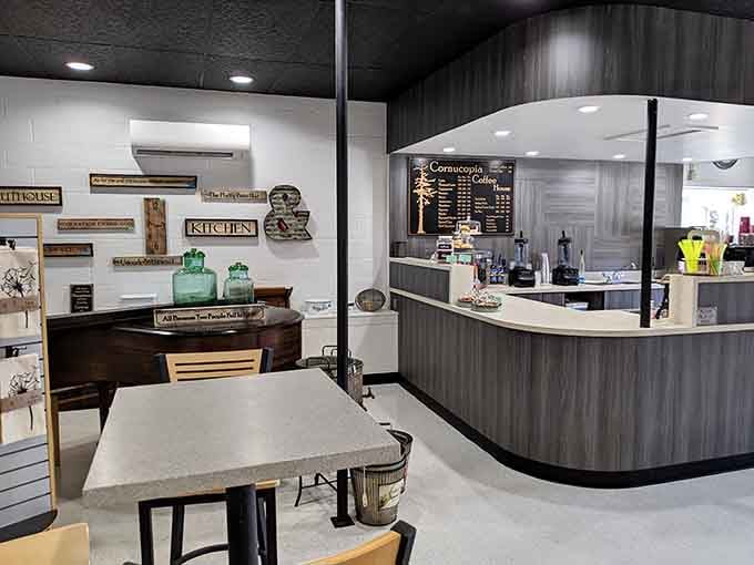 Clean modern counters, warm wood tones, and a chalkboard menu at Cornucopia Coffee House that makes choosing feel like a delightful problem.