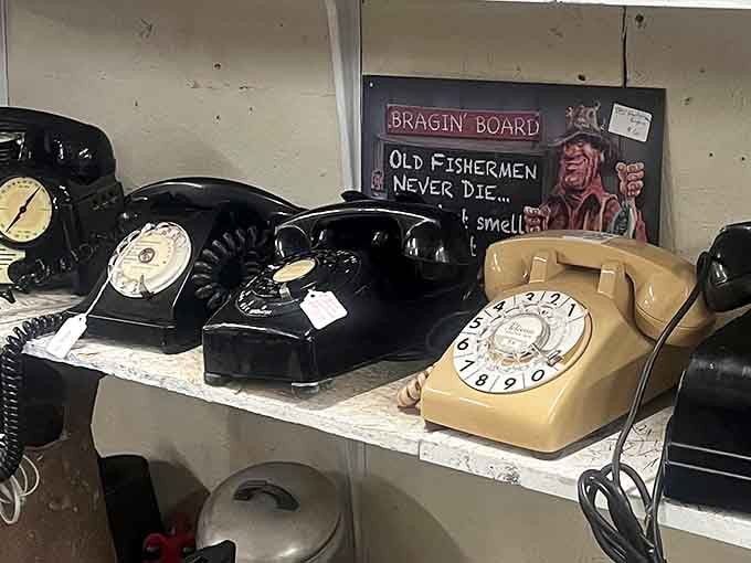 Rotary phones sitting quietly on a shelf, patiently waiting for a world that no longer needs them.