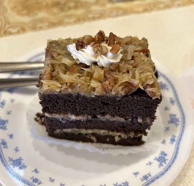 German chocolate cake layered with coconut-pecan frosting, the dessert that quietly steals the whole show.