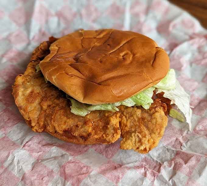 A fried chicken sandwich so generously sized it's practically waving hello before you even pick it up.
