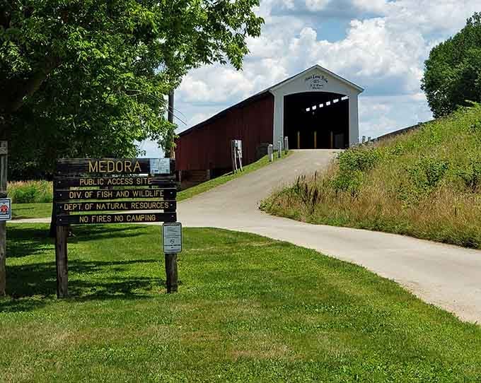 That winding road leading straight to the bridge entrance feels like the opening scene of a really good road trip movie.