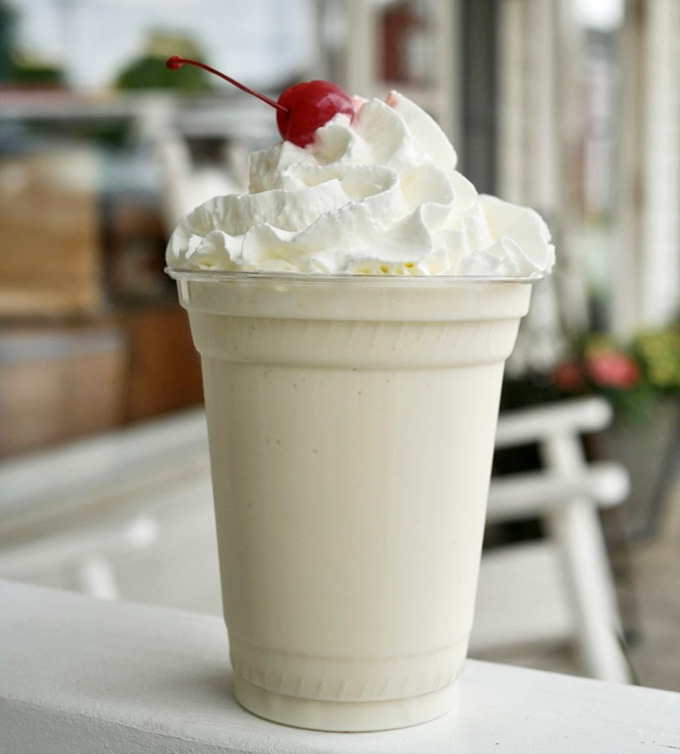 Whipped cream, a cherry on top, and a shake so thick it requires genuine commitment from your straw and your bicep.
