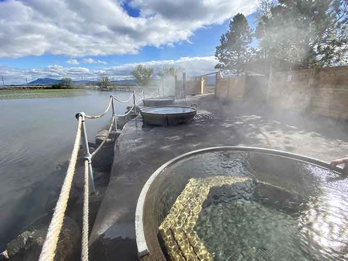 Steam rising, water glowing, and mountains watching from a distance. Nature put on a show here.