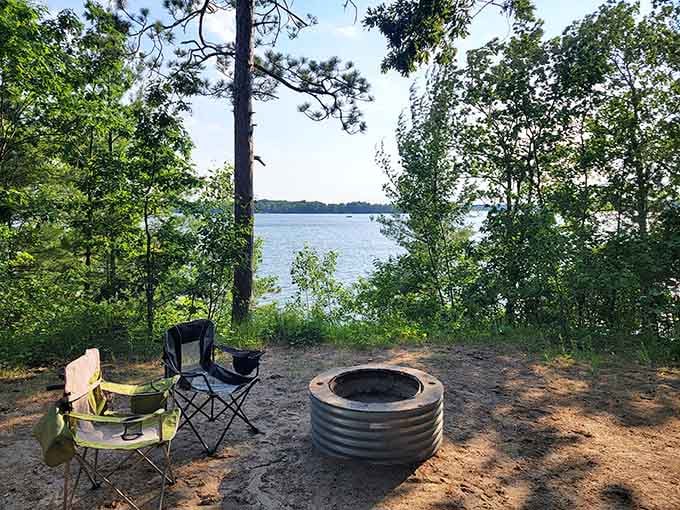 Two chairs, one fire ring, and a lake view that makes every problem feel smaller.