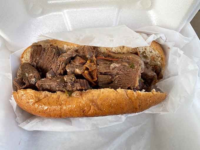 That roast beef sandwich is piled so high with tender meat, you'll need both hands and serious determination.