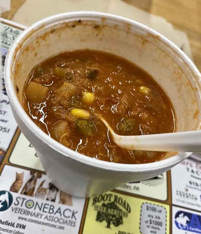 Hearty crab soup that warms you from the inside out, proving this place does more than dogs.