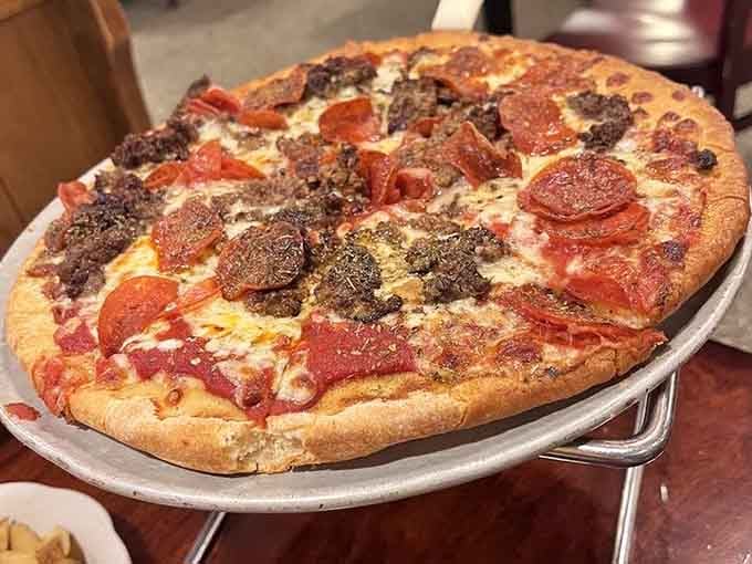 A proper pizza loaded with pepperoni and sausage. Crispy, generous, and completely unapologetic about it.