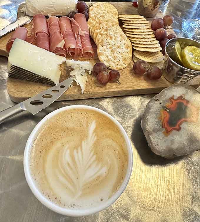 Now that's what I call a proper charcuterie spread, complete with artisan cheeses and fresh grapes for good measure.