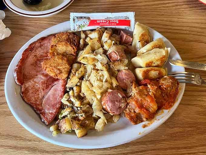 Ham, saut&eacute;ed cabbage, kielbasa, pierogi, and cabbage rolls. This plate means serious, committed, no-regrets business.