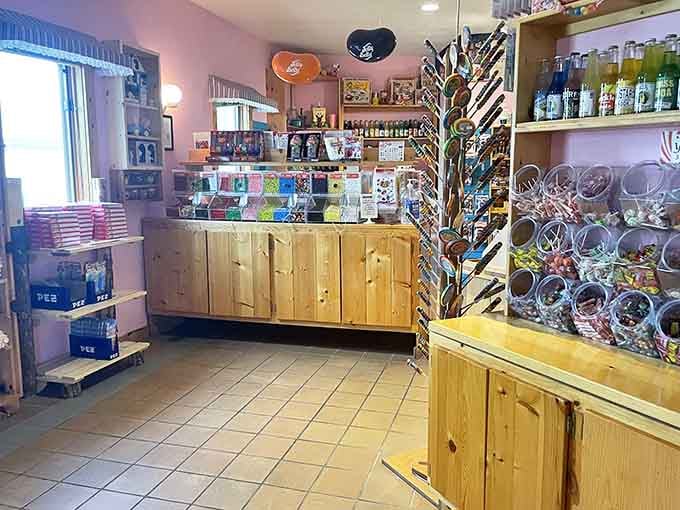 The candy counter gleams with possibilities while that whimsical tree sculpture adds just the right touch of magic.