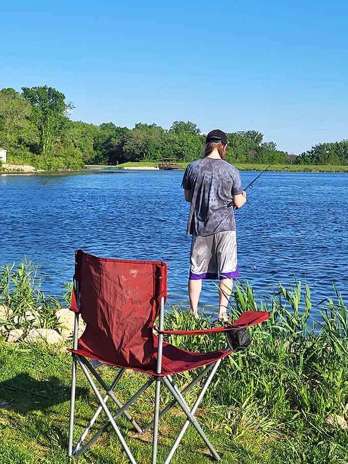 Fishing at Lake Le-Aqua-Na, where patience is the only skill required and the view makes waiting genuinely enjoyable.