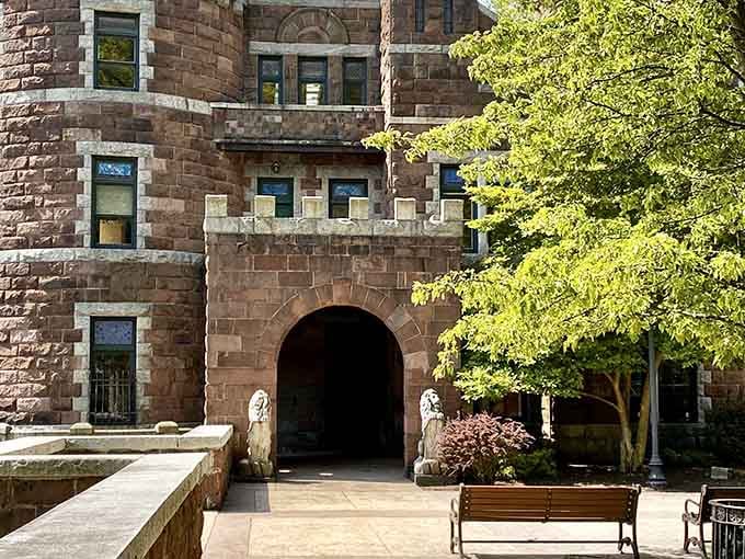Two stone lions flank the entrance archway, silently asking if you're worthy enough to walk through.