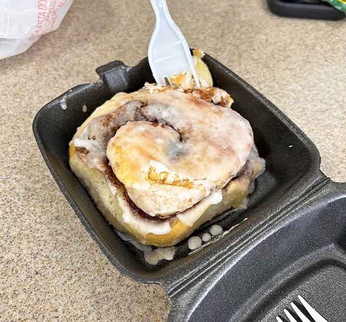 That cinnamon roll glistens with sweet glaze, tempting you to order dessert before you've finished breakfast.