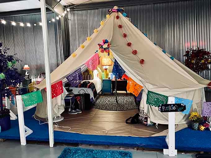 Papel picado banners and colorful fabrics make Punkie's Place the most festive tent in the whole building.