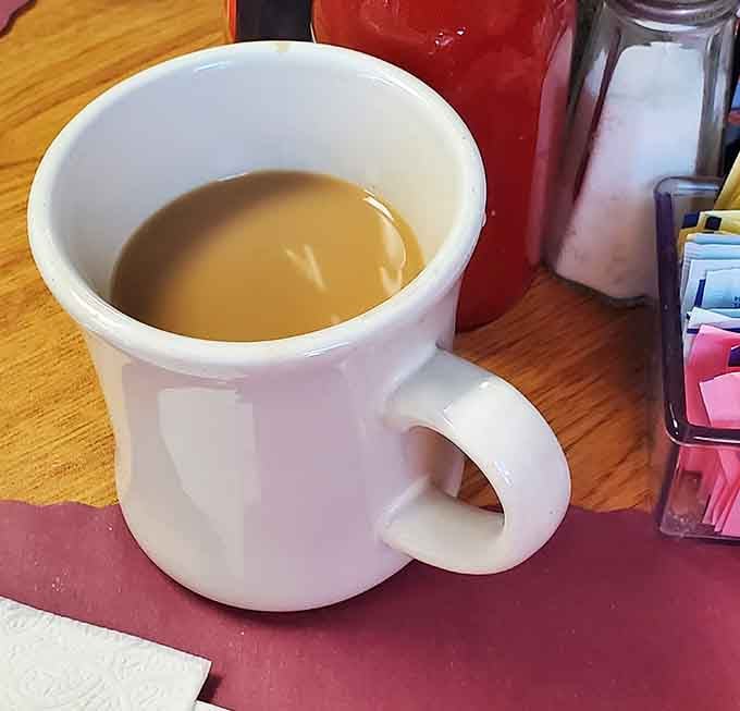Simple white mug, hot coffee, endless refills: sometimes the best things in life really are uncomplicated.