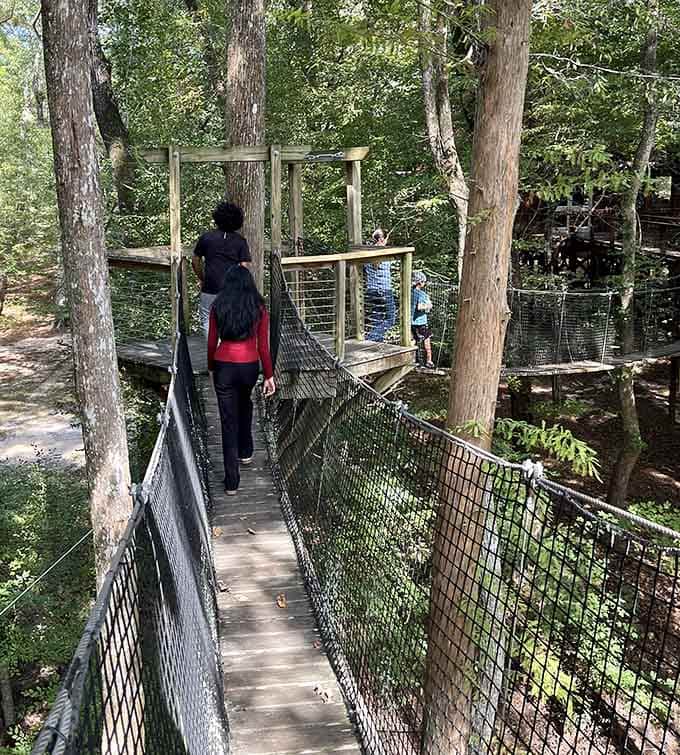 Proof that the canopy walk is better with company, especially when someone else goes first.