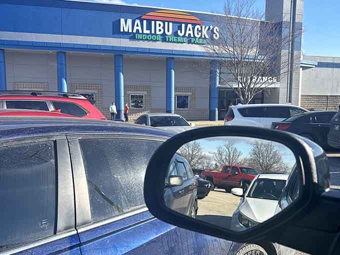 Spotted through a rearview mirror, the Malibu Jack's sign on a crisp winter day looks like pure promise.