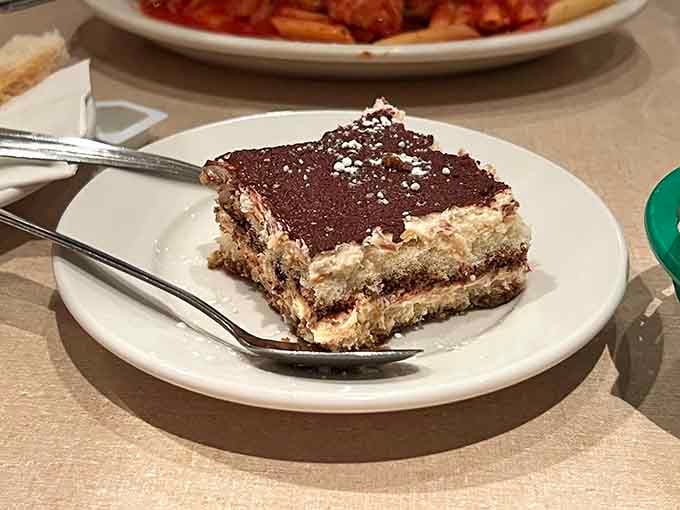 Mama Santa's Tiramisu, layered with mascarpone and dusted with cocoa, is the dessert that ends all dessert arguments.