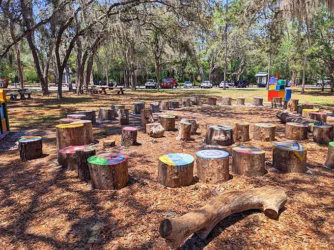 Painted tree stumps and open sky. This is what a perfect afternoon looks like for kids and adults alike.